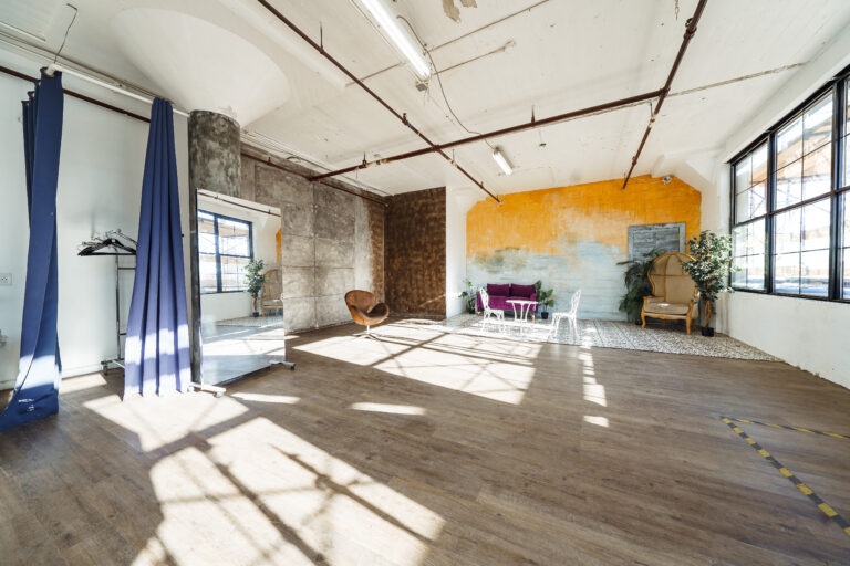 A large Loft-like photo studio in NY with Moroccan tile, textured ...
