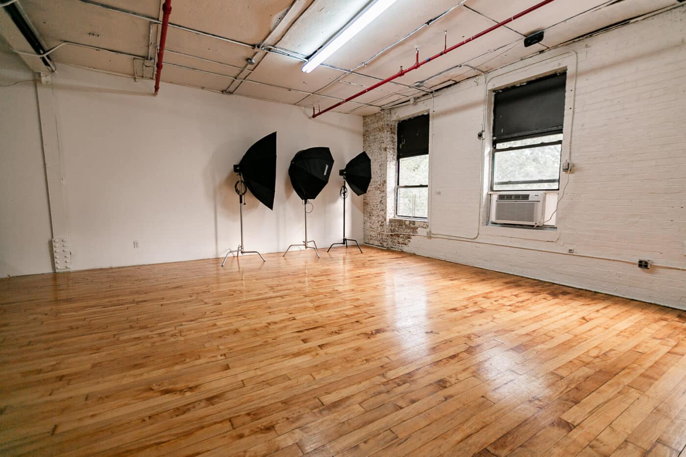 Photo studio with white brick and west windows | FD Photo Studio